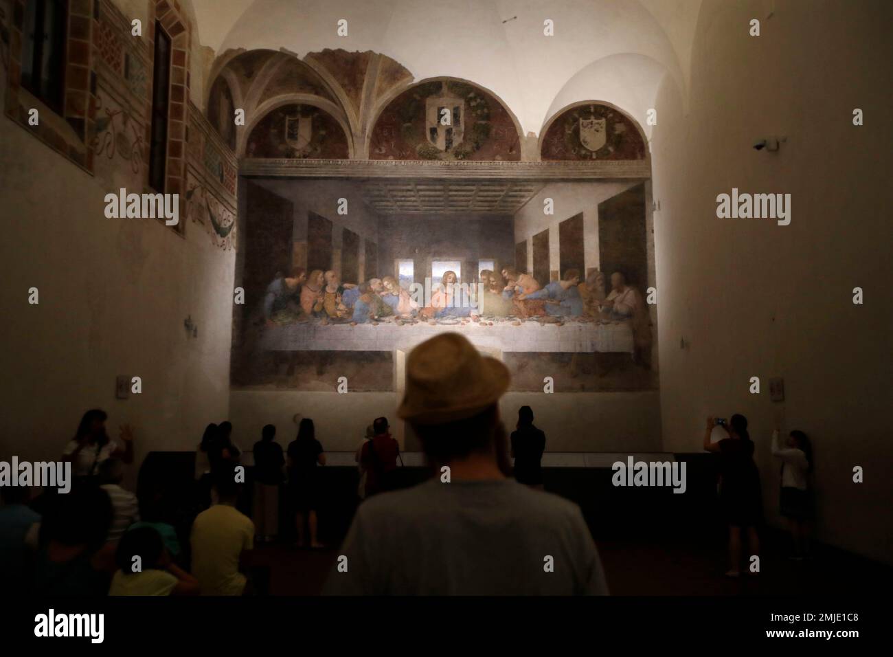 People admire the Leonardo da Vinci's paint 'Last Supper', dating back ...
