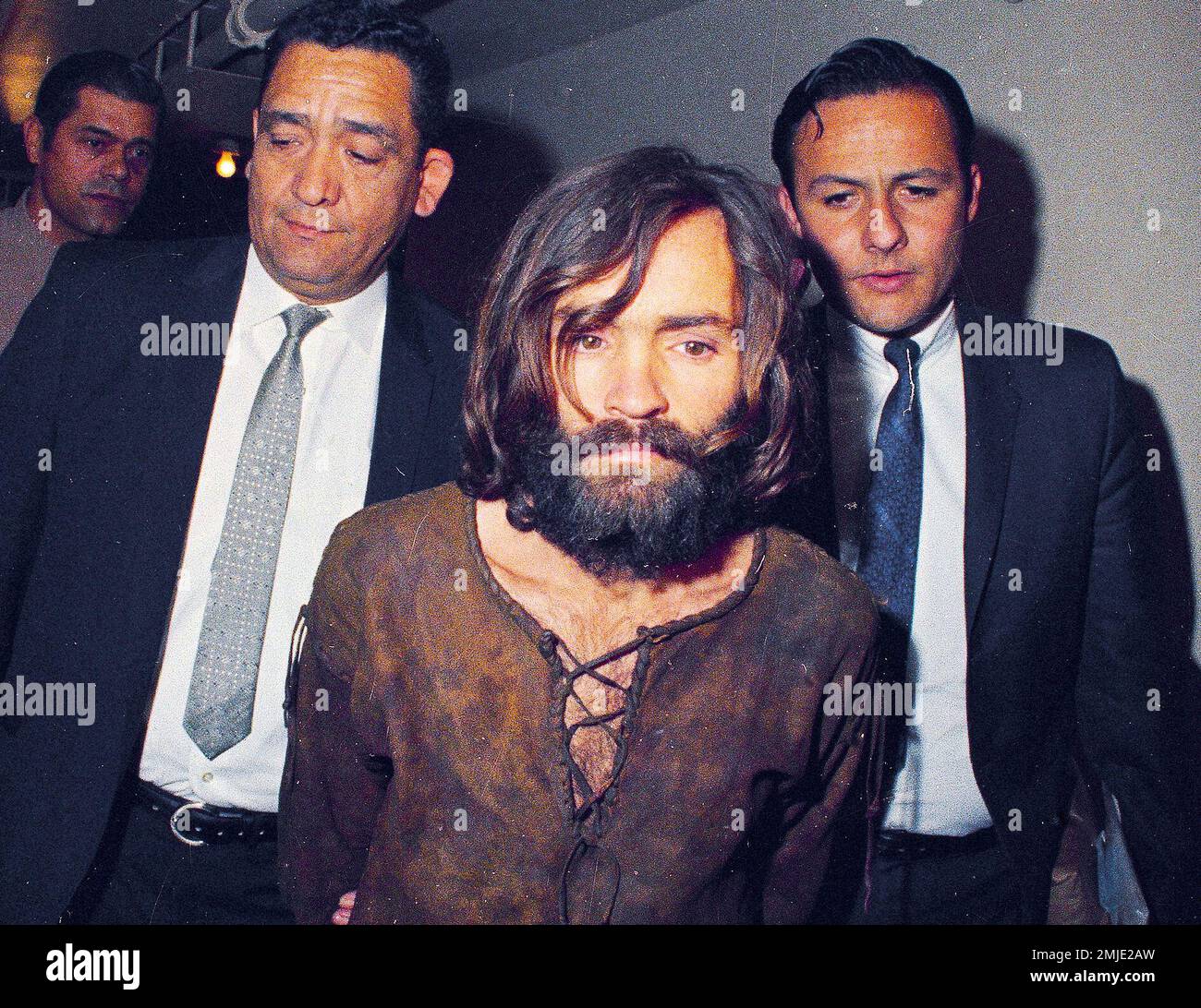 FILE - In this 1969 file photo, Charles Manson is escorted to his ...