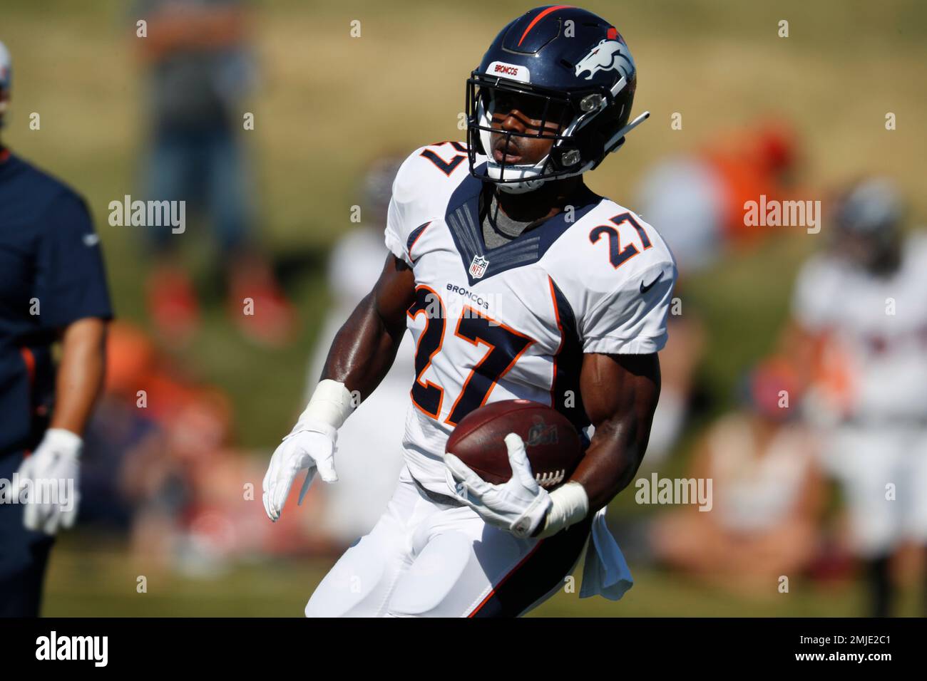 Denver Broncos running back Theo Riddick (27) takes part in drills ...