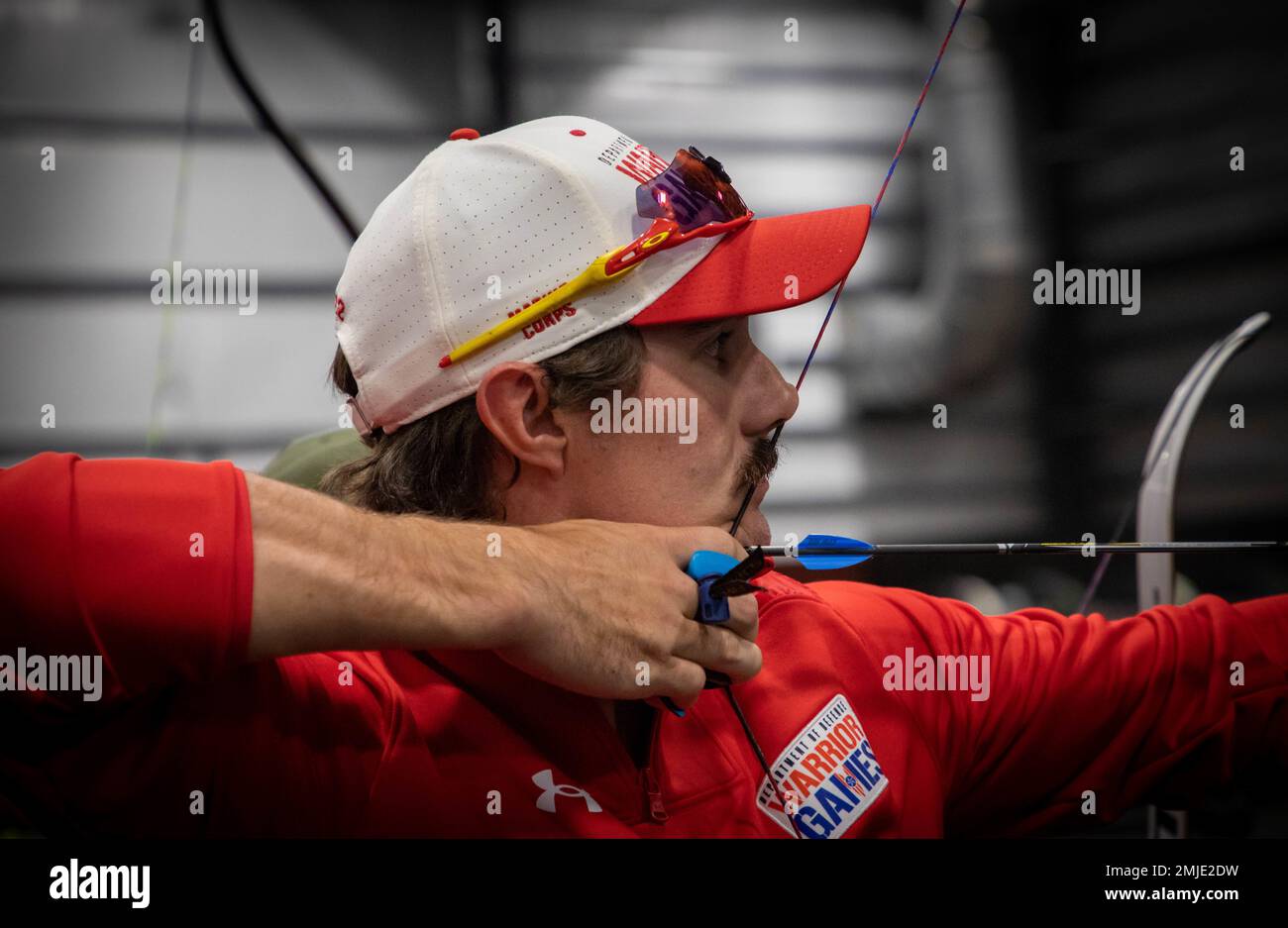 U.S. Marine Corps Sgt. Patrick MacDonald, veteran, competes in archery ...