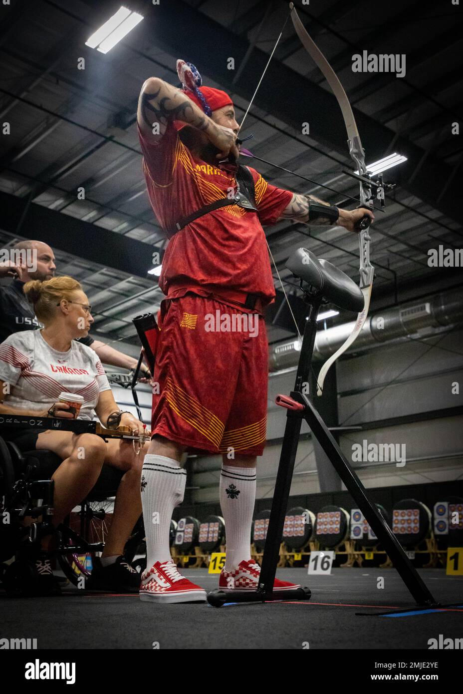 U.S. Marine Corps Sgt. Peter Lykins, veteran, competes in archery ...