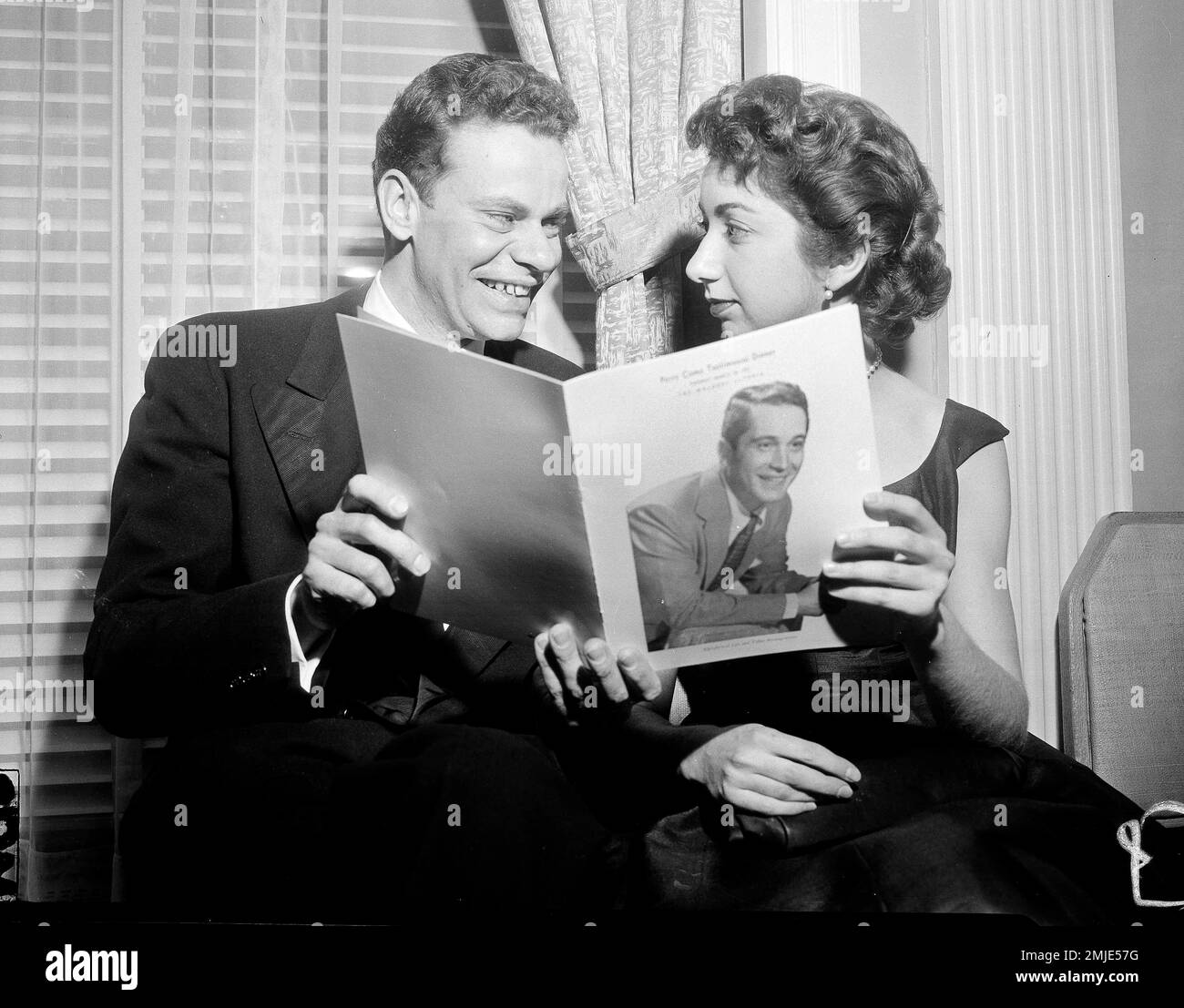 Charles Van Doren of "Twenty-One" TV quiz show fame, sits with his ...
