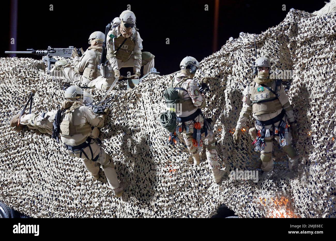 Members of the Saudi special forces perform during a military parade in ...
