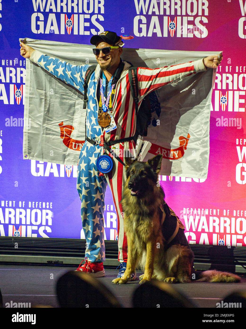 Retired U.S. Army Staff Sgt. Michael Murphy and his dog Maverick pose ...