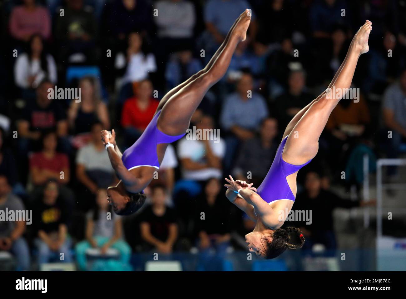 Cuba's Anisley Garcia and Arlenys Garcia compete in the women's diving ...