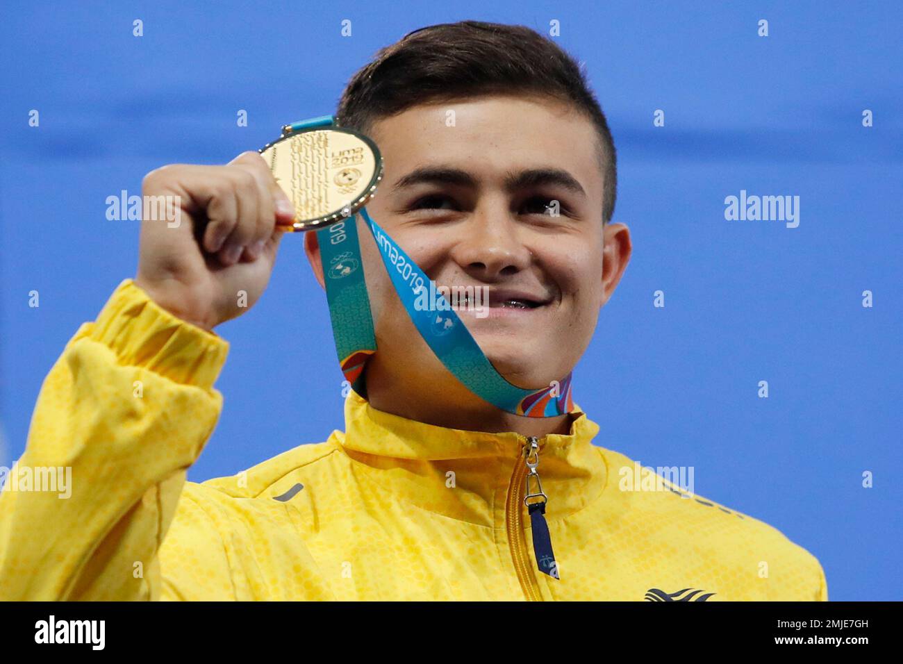 Colombia's Daniel Restrepo of Colombia shows his gold medal at the ...