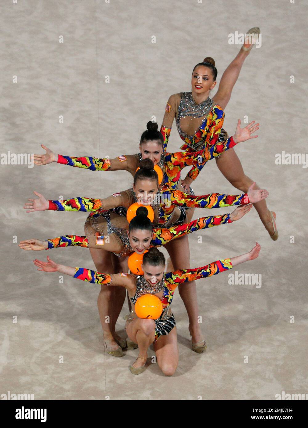 The U.S. team competes in five balls during the rhythmic gymnastics ...