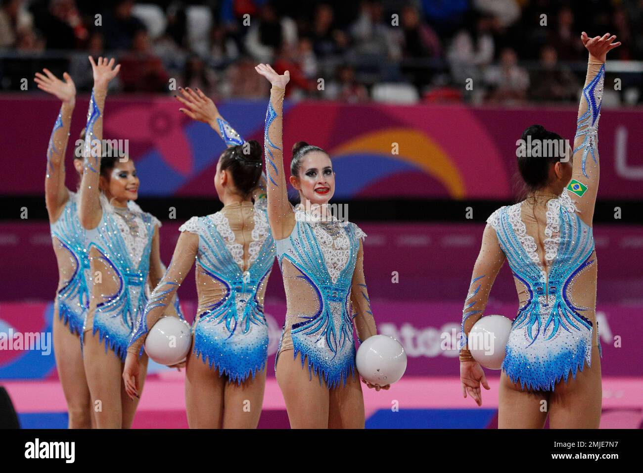 Team Brazil waves after winning the bronze medal in five balls rhythmic ...