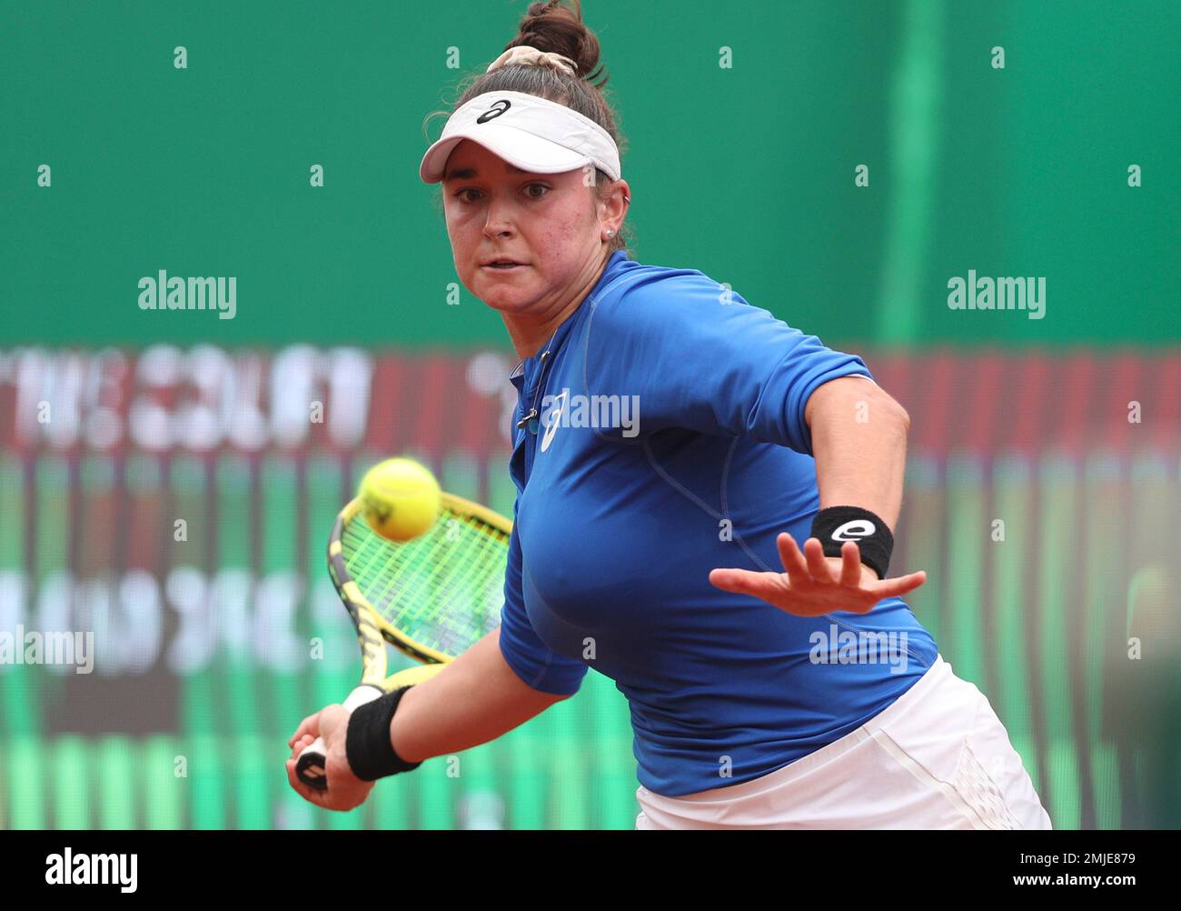 Caroline Dolehide of the United States returns a shot from Nadia ...