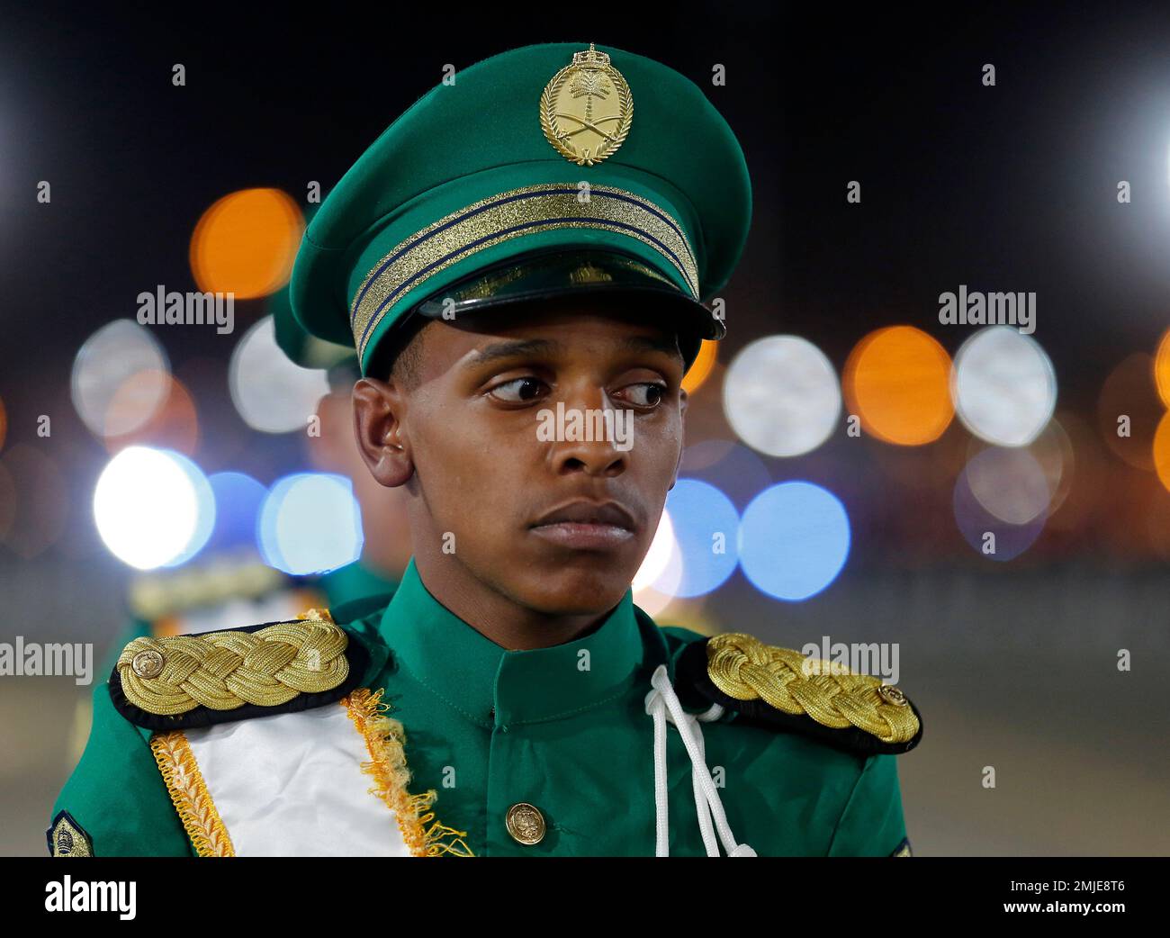 A member of the Saudi honor guard stands alert during a military parade ...