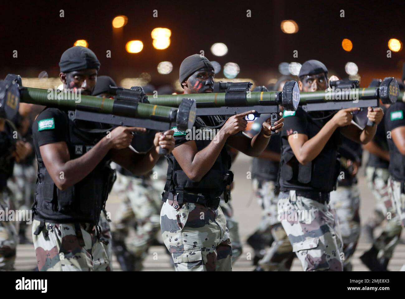 Members of the Saudi special forces perform during a military parade in ...