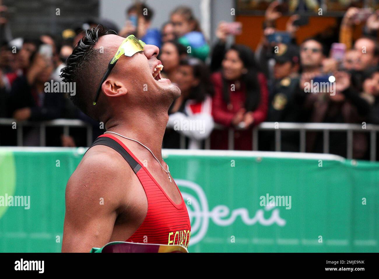 Brian Pintado of Ecuador celebrates winning the gold medal in the men's ...
