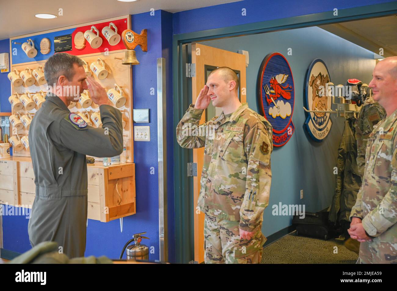 Maj. Gen. Bryan Radliff, 10th Air Force commander, coins Tech. Sgt ...