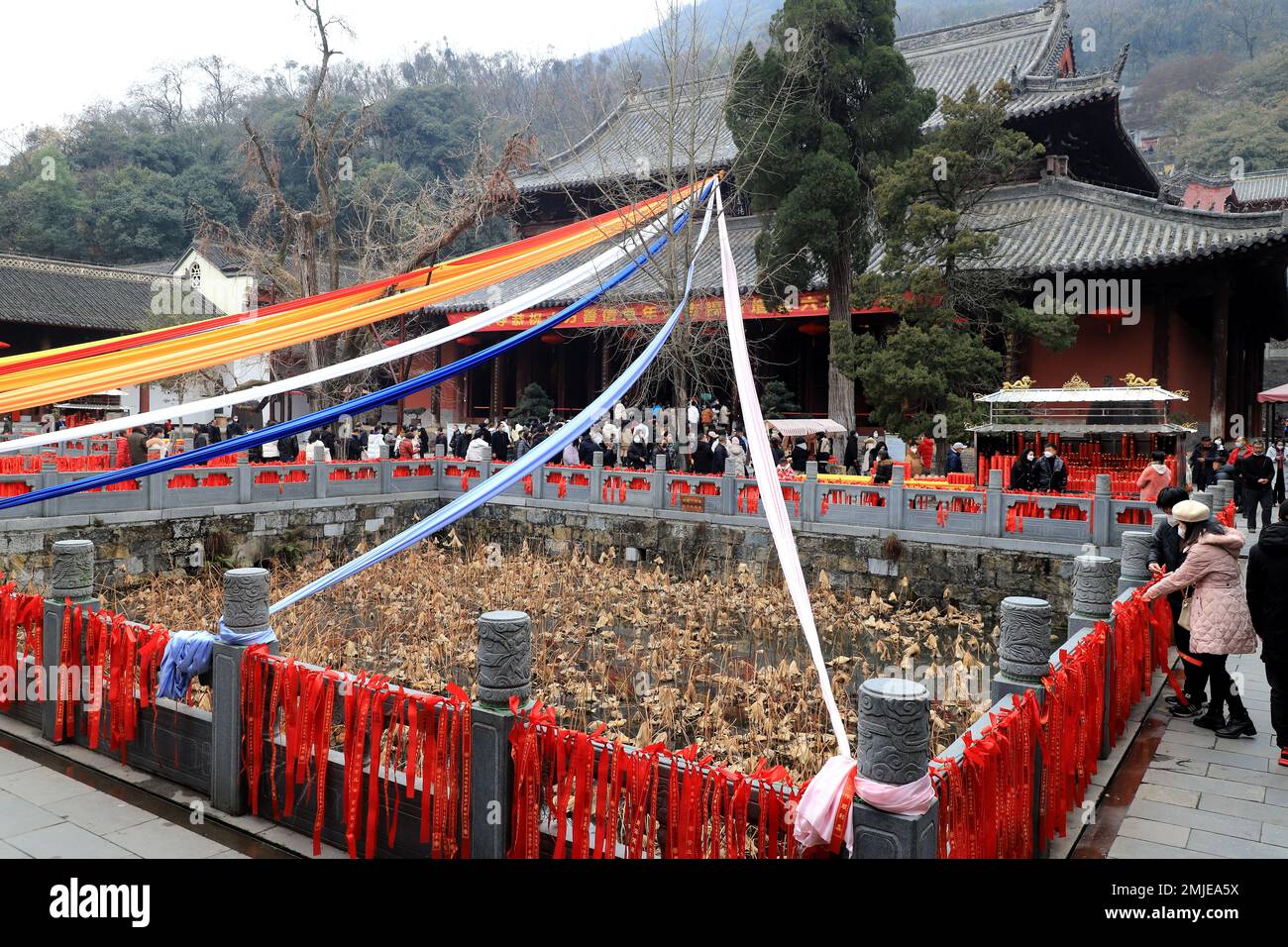 YICHANG, CHINA - JANUARY 22, 2023 - People burn incense and wax lamps ...