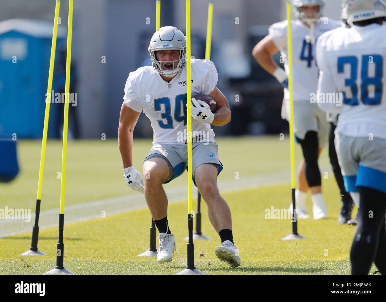 Detroit Lions running back Zach Zenner runs through a drill at the ...