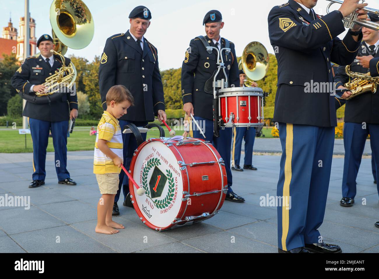 Myron, a Ukrainian boy, displaced to Lithuania, plays a drum belonging ...