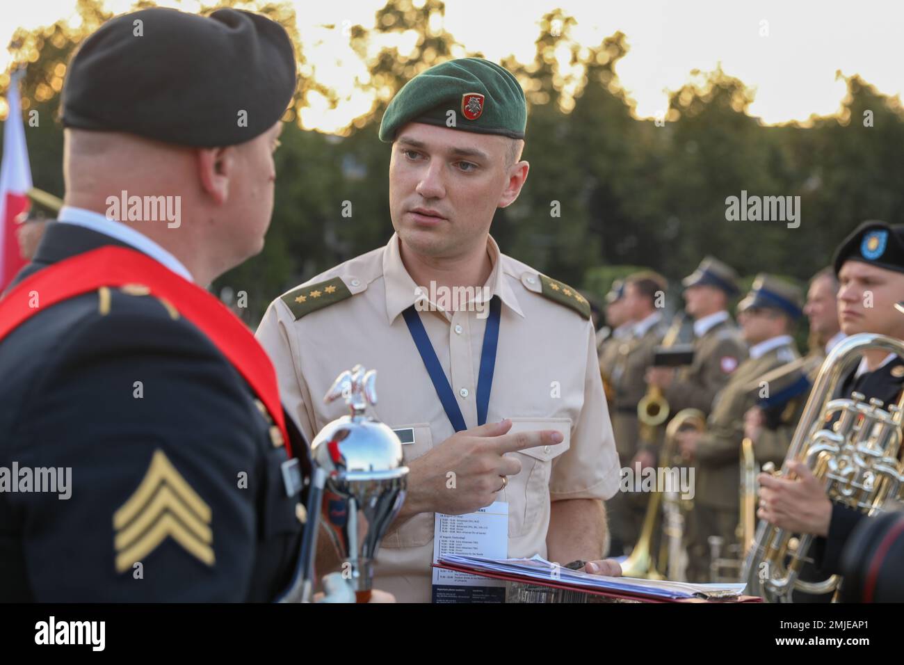 U.S. Army Sgt. Jeremy Leach, left, drum major of the 1st Infantry ...