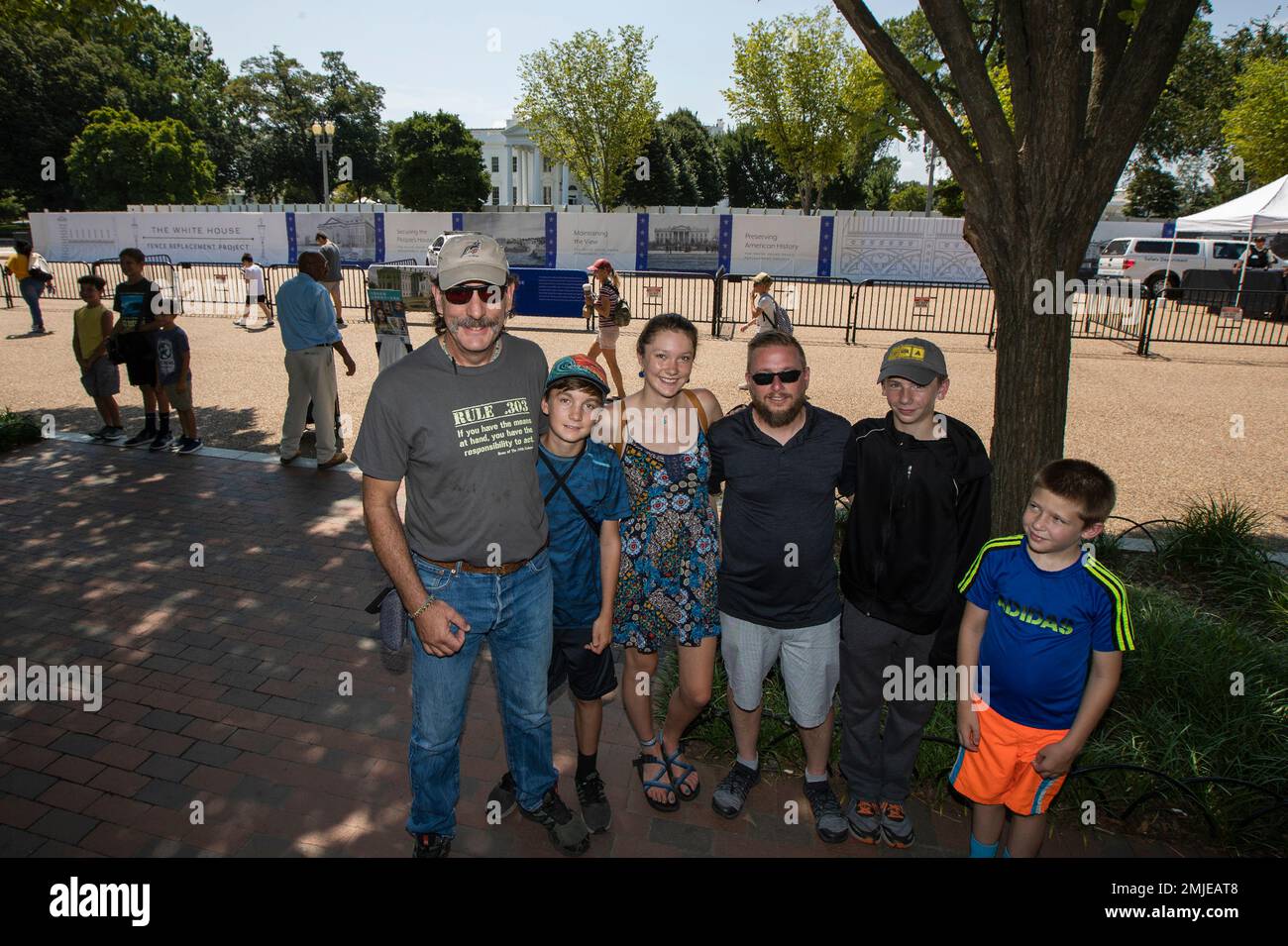Joe Loetscher, from left, from Colorado Springs, Colo., and his family ...