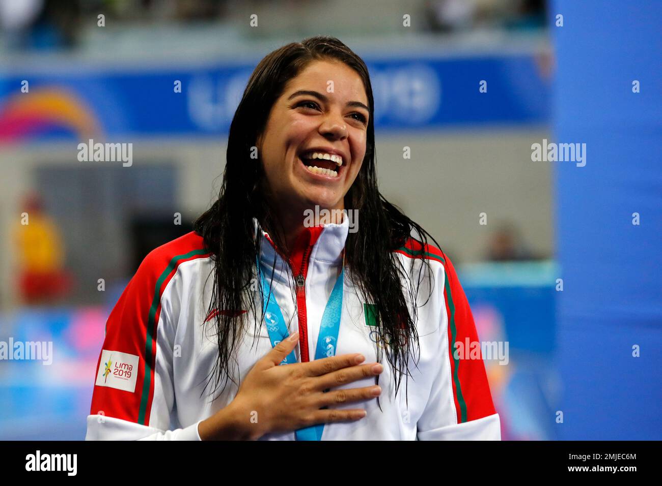 Mexico's Alejandra Orozco celebrates after receiving her bronze medal ...