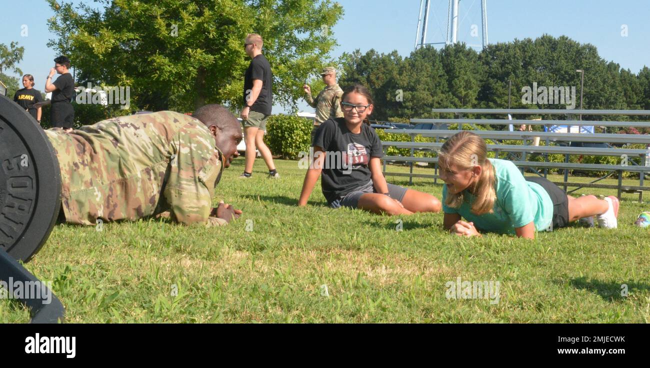Performing the Army Combat Fitness Test plank exercise, Command Sgt ...