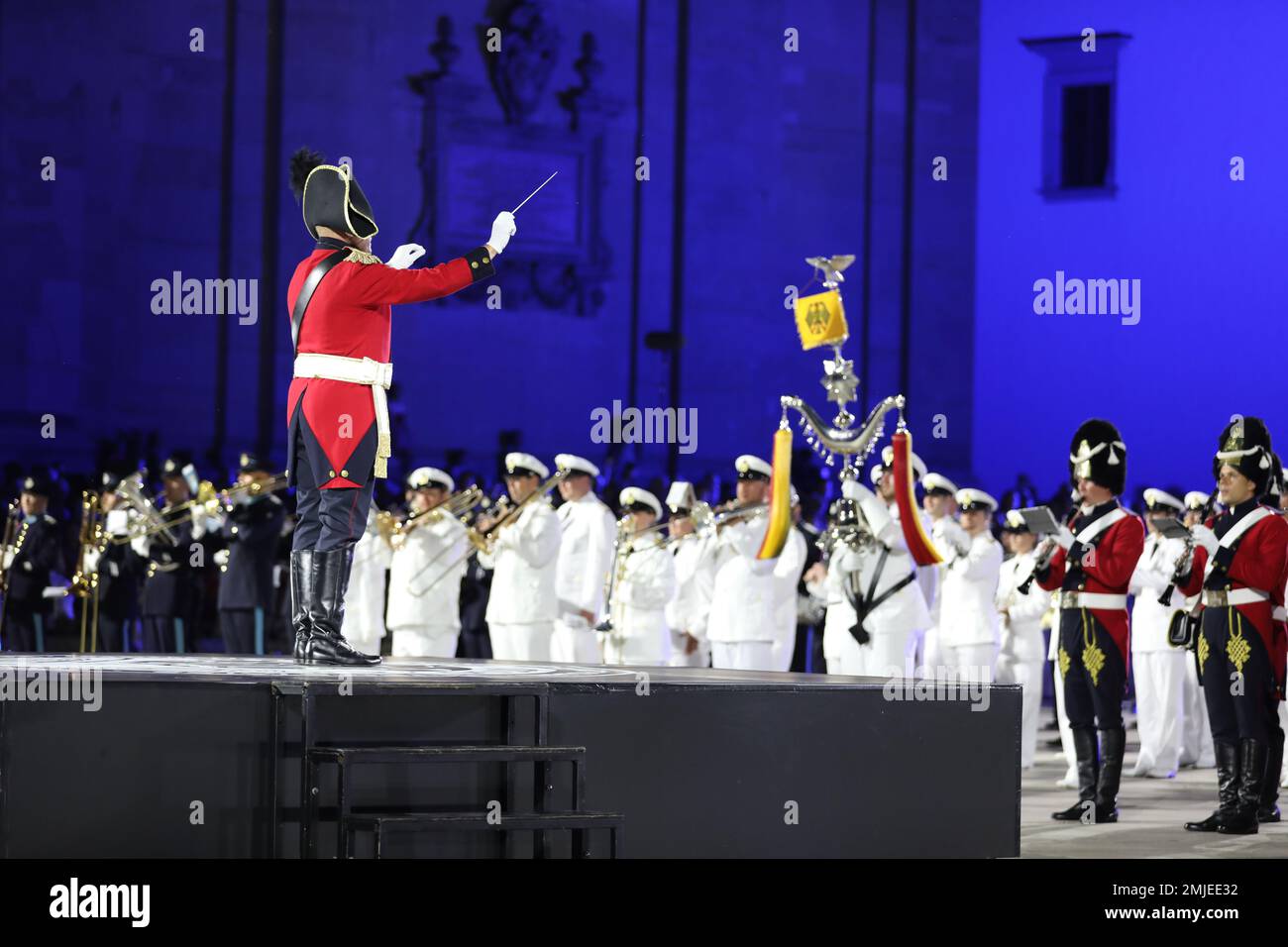 A Lithuanian soldier conducts ten military bands from various NATO ...