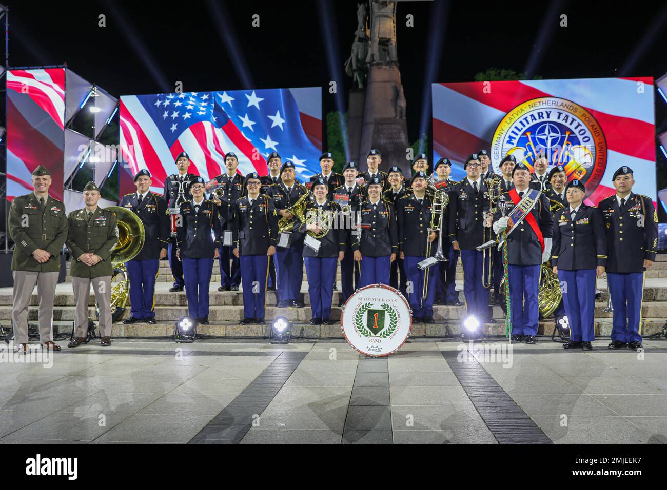 The 1st Infantry Division Band poses for a photo with Maj. Gen. John V ...