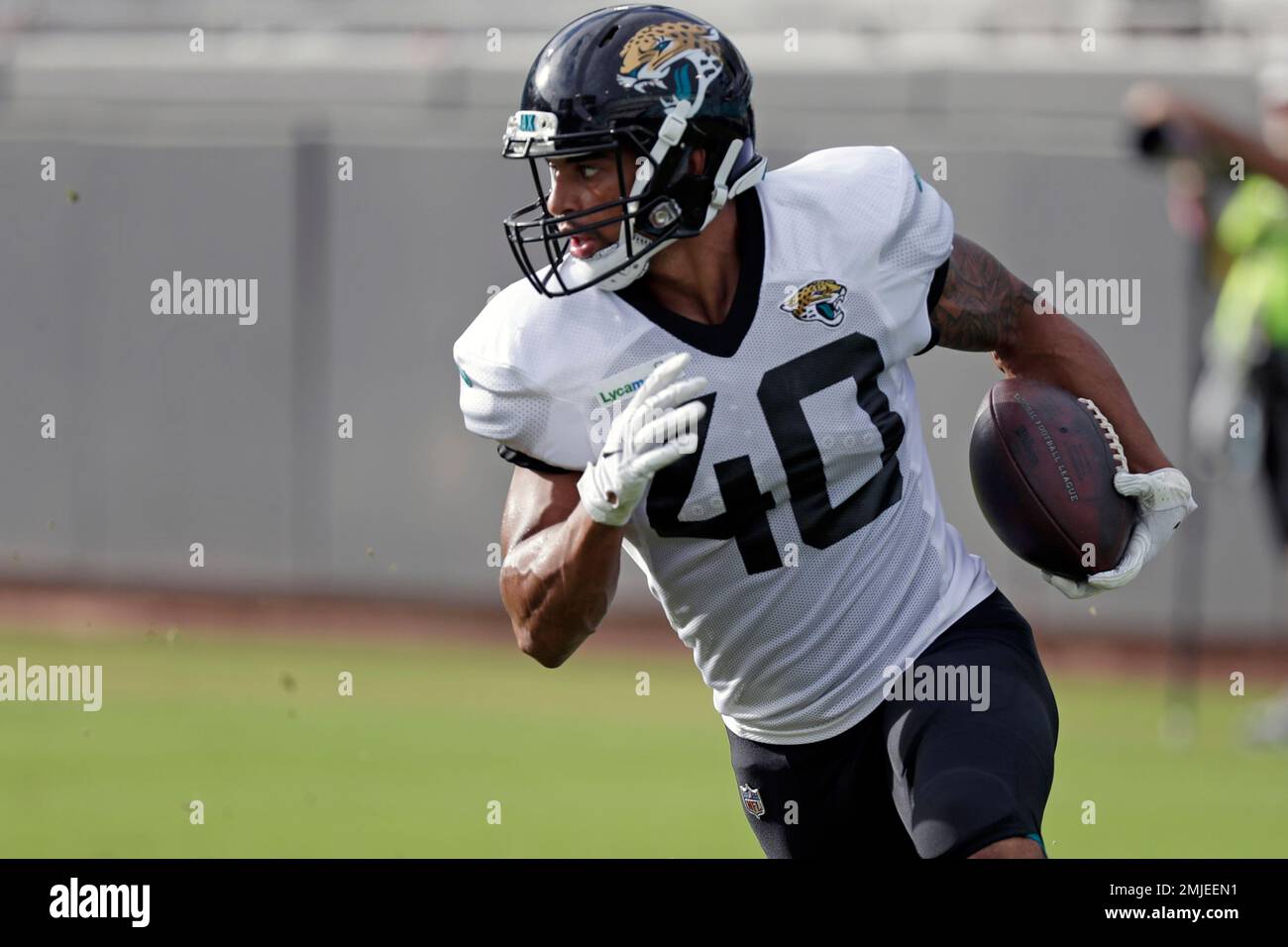 Jacksonville Jaguars cornerback Brandon Watson runs with the ball after ...