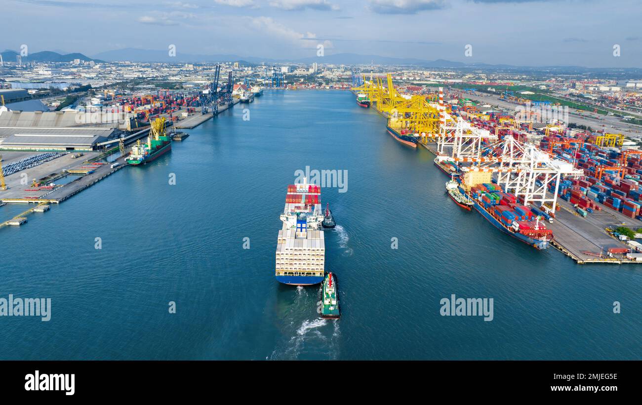 Stern of cargo ship carrying container and running for import goods ...