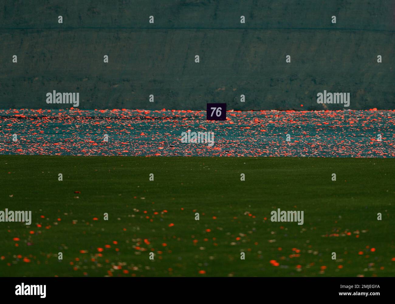 Broken clay targets lie scattered on the range during the women's skeet ...
