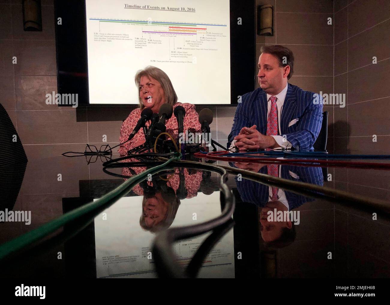 Vicki Timpa and attorney Geoff Henley answer questions from reporters ...