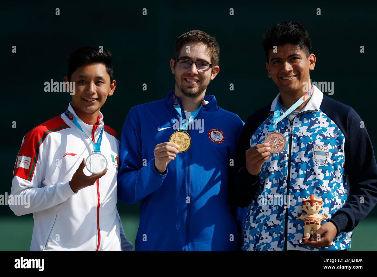 Medalists in the men's shooting 10-meter air rifle, from left, silver ...