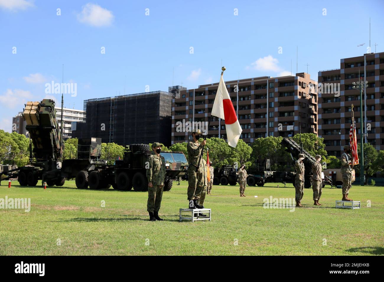 The Japanese and U.S. Flag are presented by color guards at the opening ...