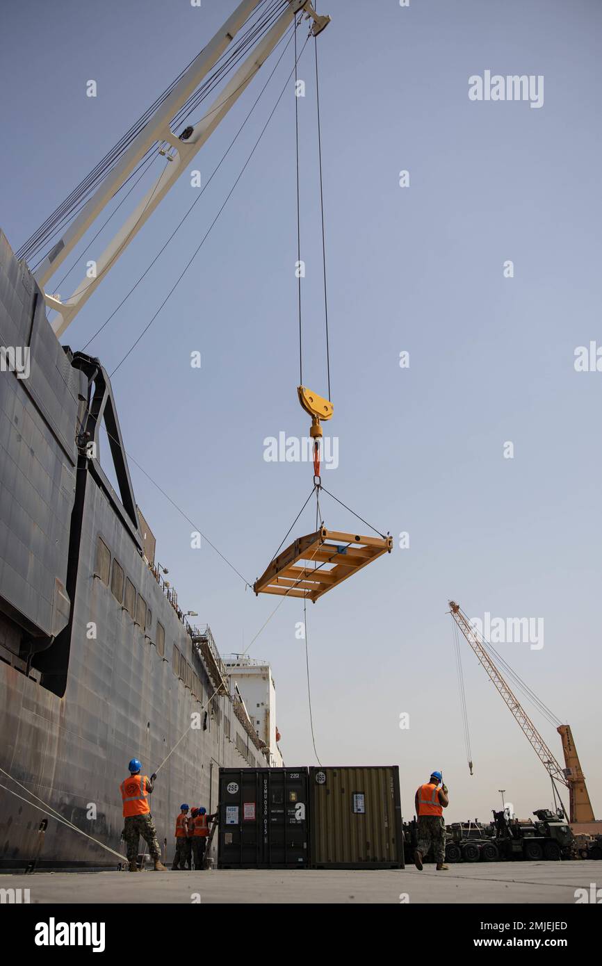 U.S. Navy Sailors with Navy Cargo Handling Battalion ONE prepare cargo ...