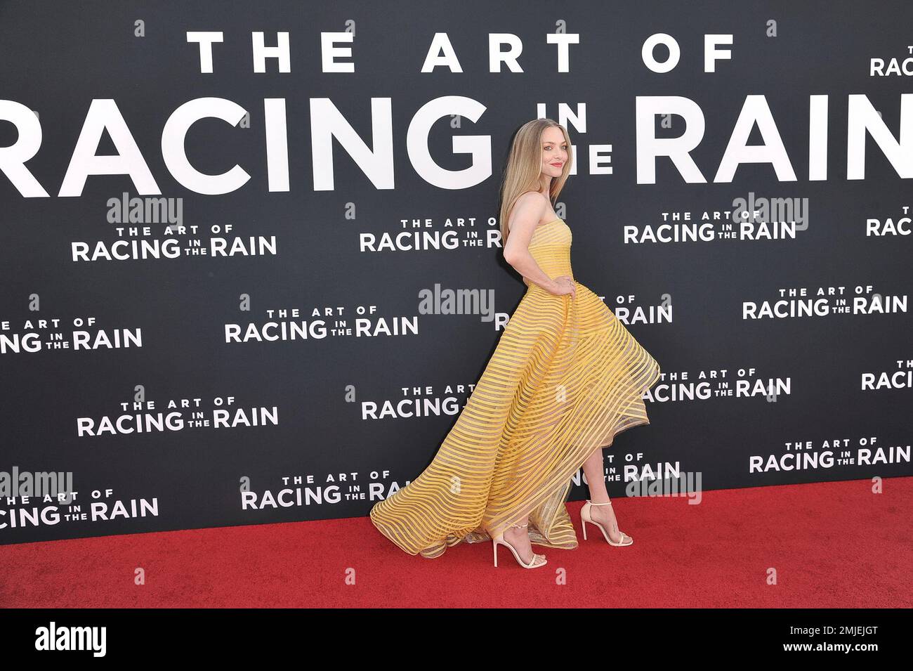 Amanda Seyfried attends the LA premiere of "The Art of Racing in the ...