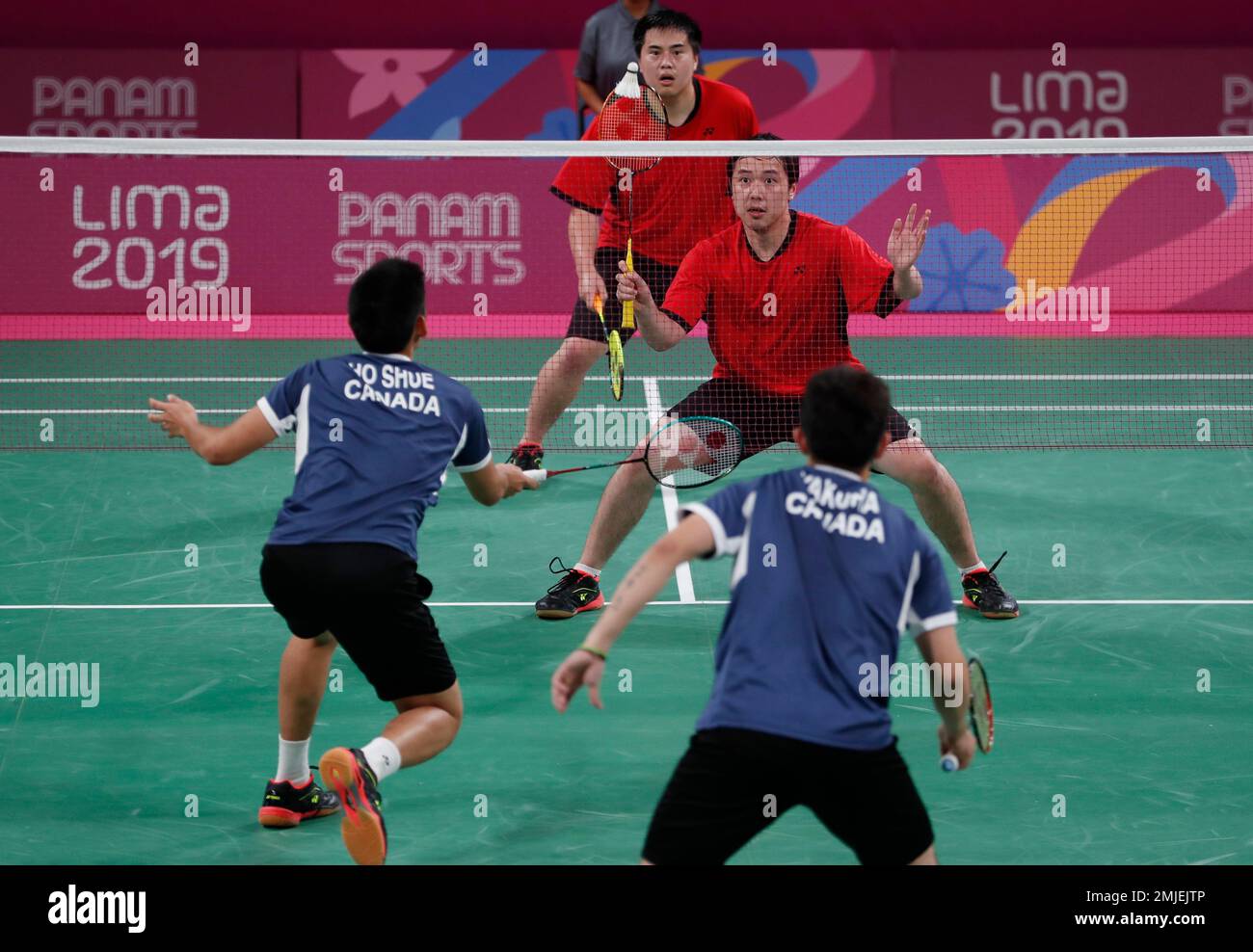Phillip Chew, and Ryan Chew of the United States, top, return a shot ...