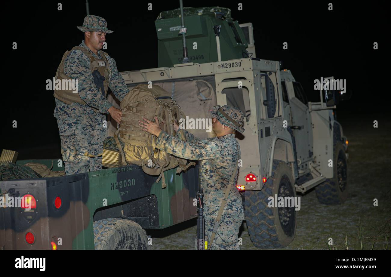U.S. Marine Corps Cpl. Jessie Perales, left, and Cpl. Cristopher Matute ...