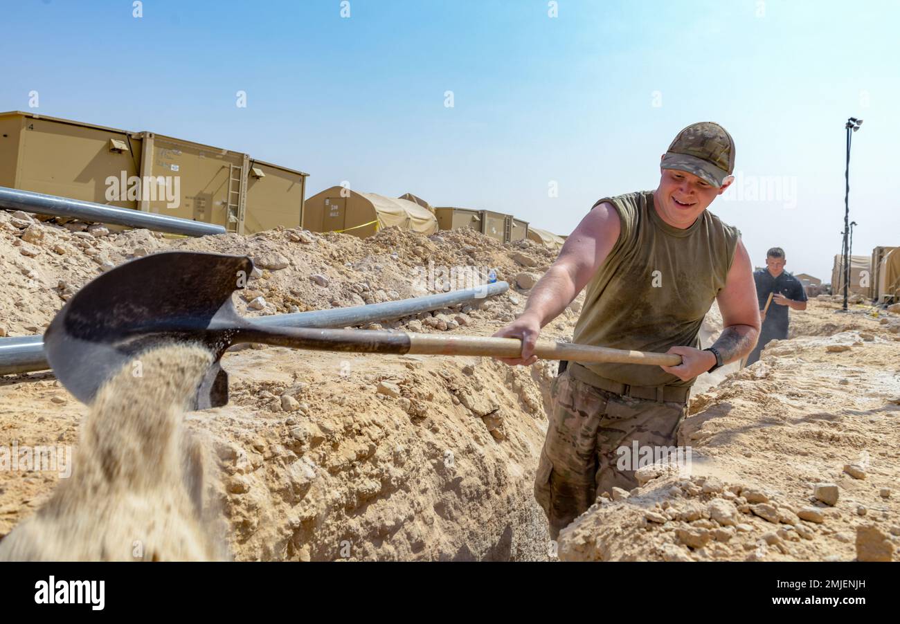 U.S. Air Force Senior Airman Eric Dishner, a water and fuels system ...