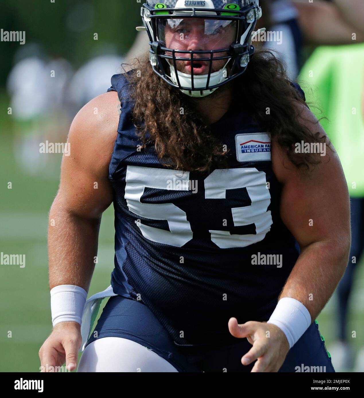 Seattle Seahawks' Joey Hunt runs through a drill at an NFL football ...