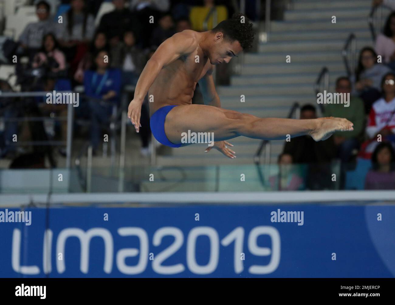 Laydel Dominguez of Cuba competes in the men's 1m springboard ...