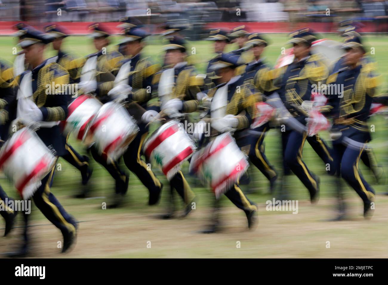 In this photo taken with a slow shutter speed, Lebanese officers parade ...