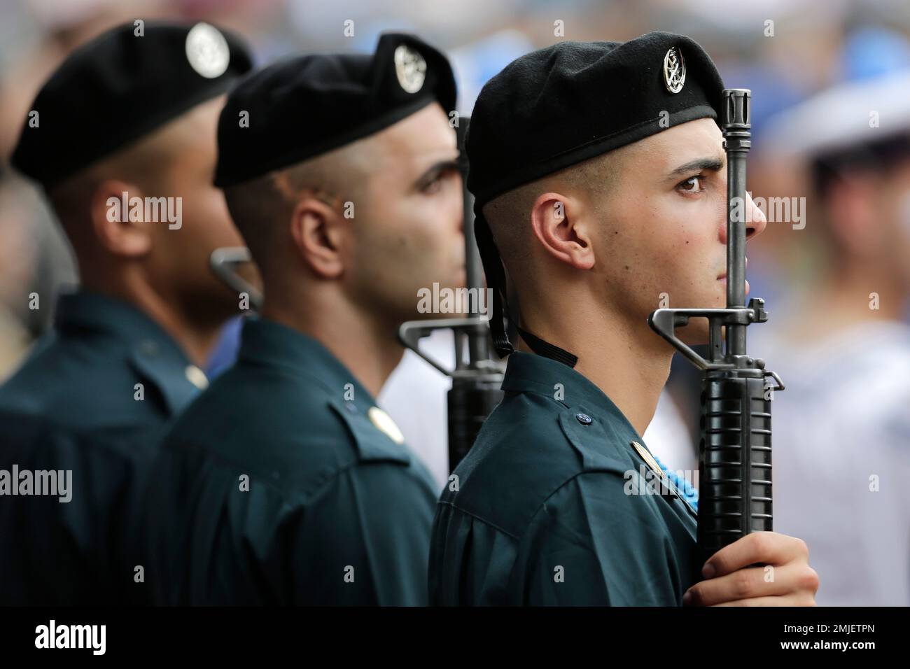 Lebanese officers parade during a graduation ceremony marking the 74th ...