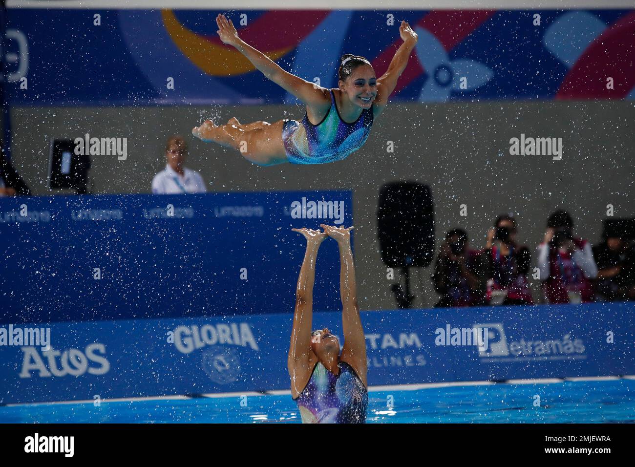 Members of Mexico's artistic swimming team compete in the free routine ...