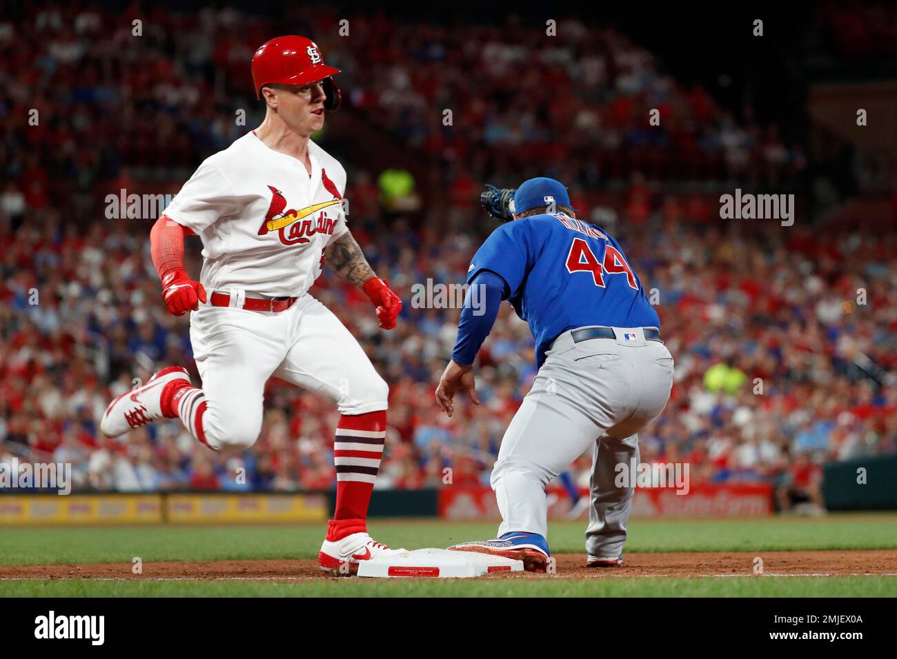 St. Louis Cardinals' Tyler O'Neill, left, is safe at first for a single ...