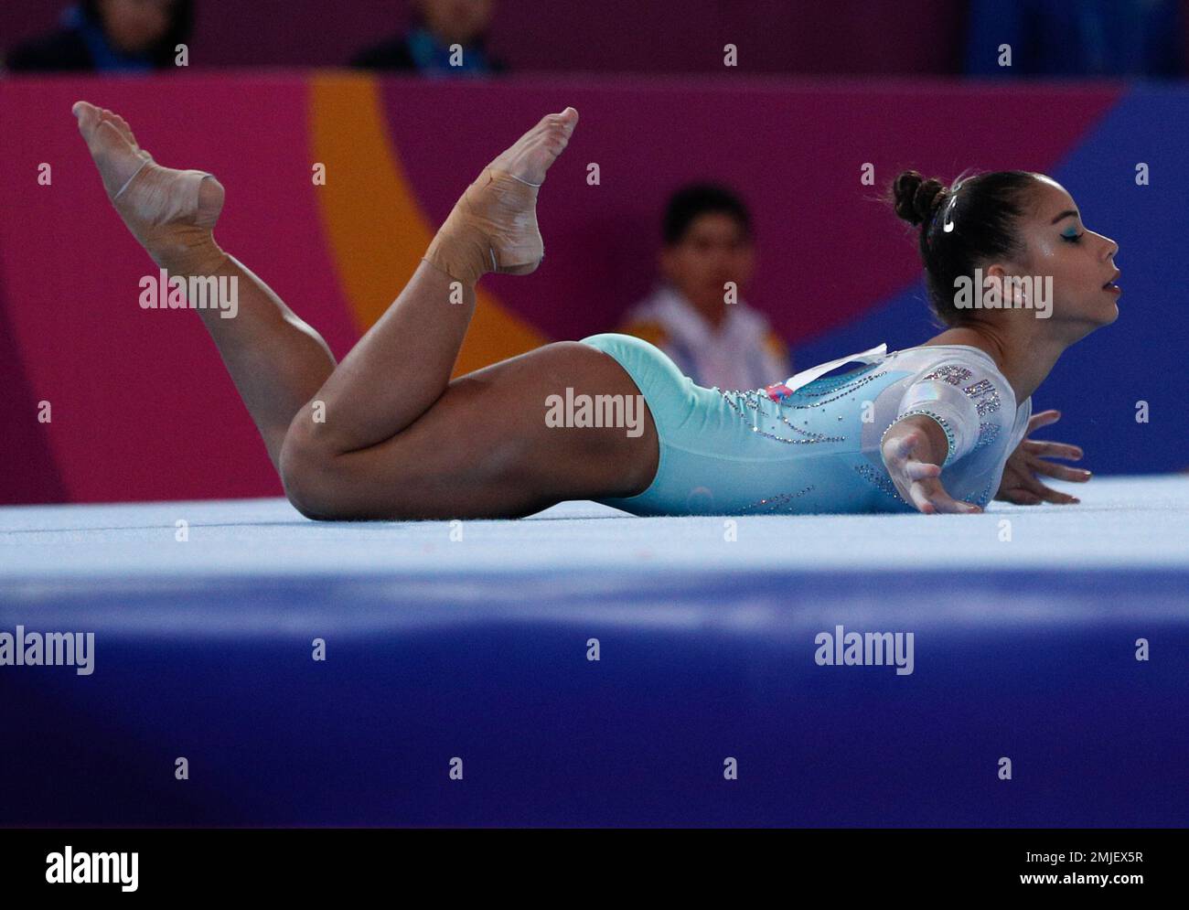 Flavia Saraiva of Brazil competes on the floor exercise in the women's ...