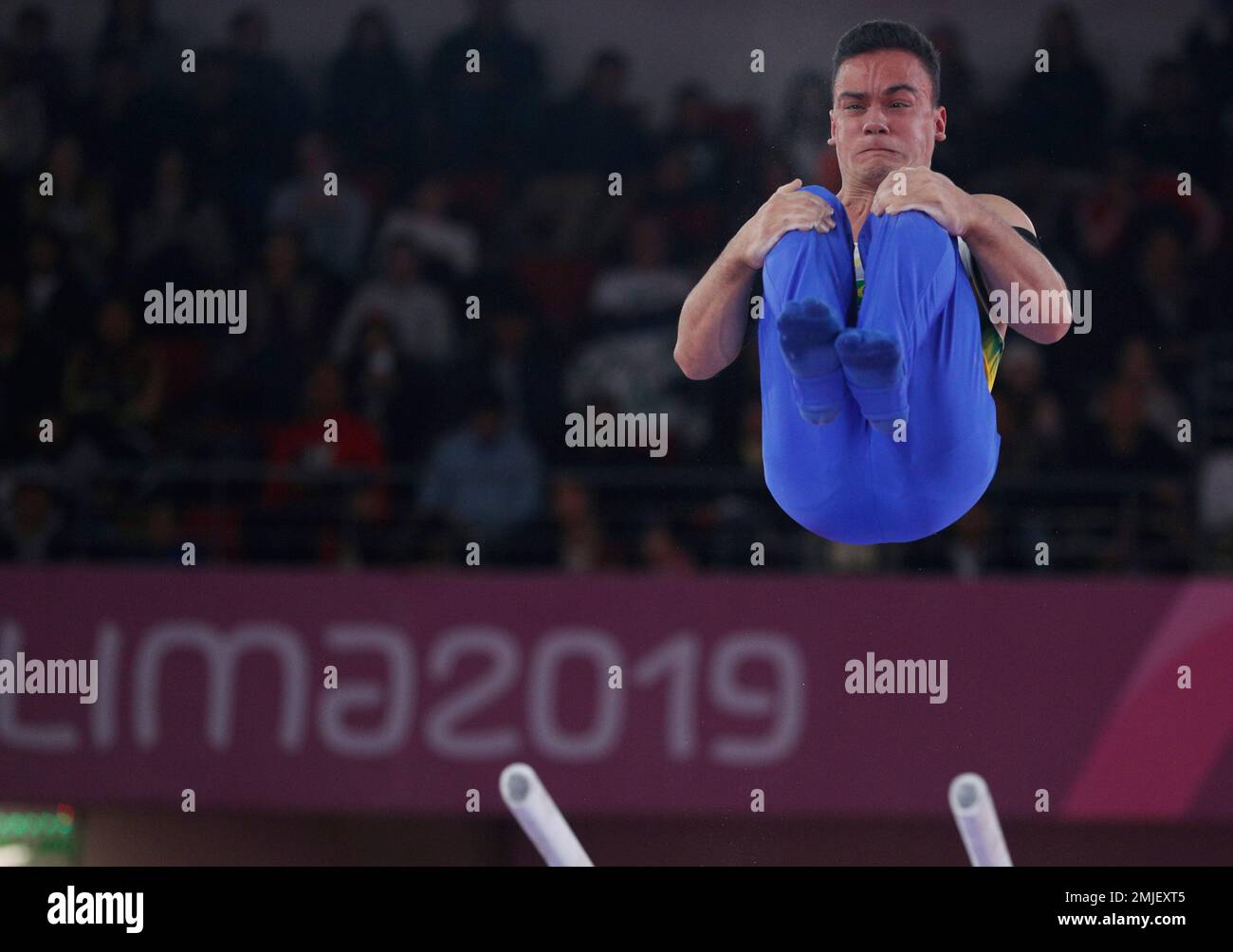 Caio Souza of Brazil competes to win silver on the parallel bars in the ...