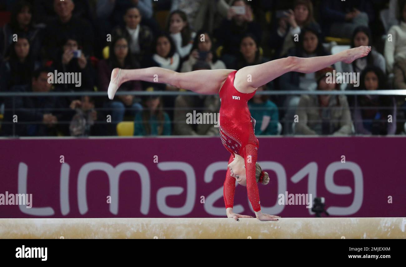 Riley McCusker of the United States competes on the beam to win the ...