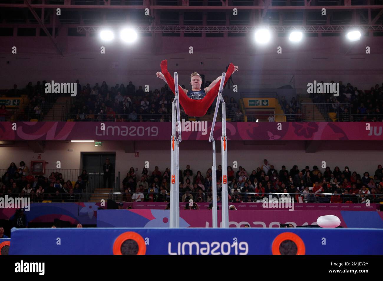 Cameron Bock of the U.S. competes to win bronze on the parallel bars in ...