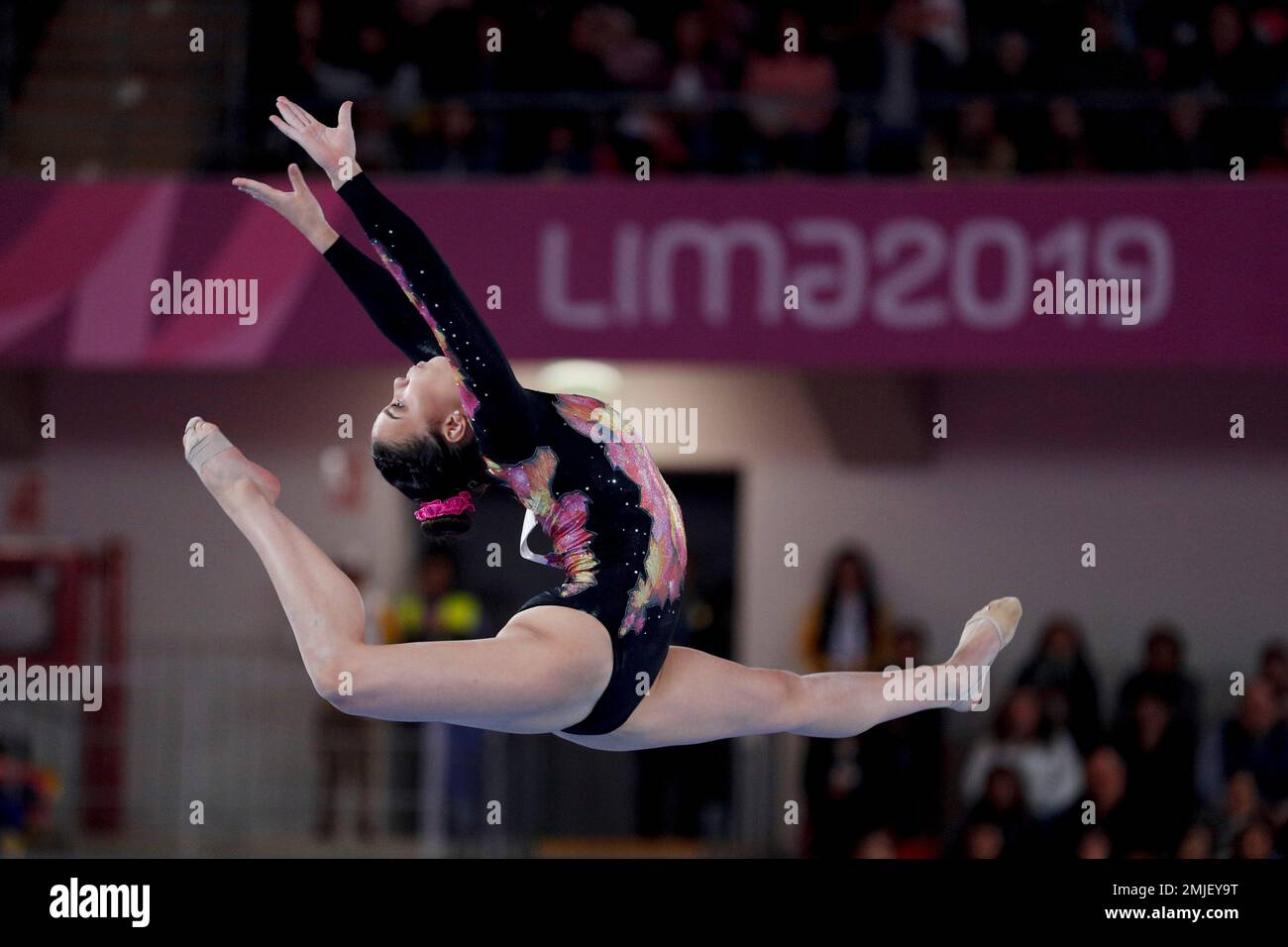 Brooklyn Moors of Canada competes on the floor exercise to win the gold ...