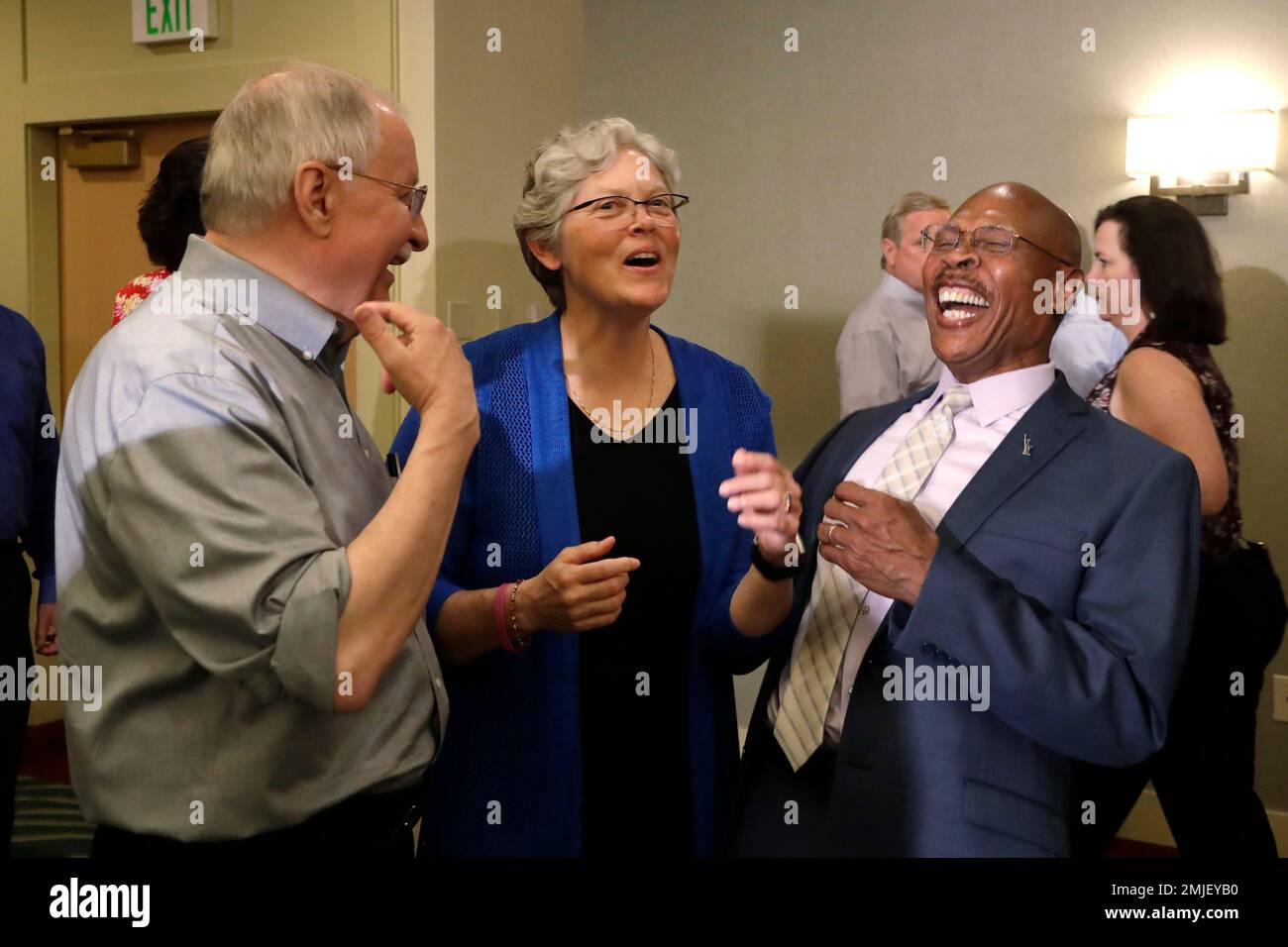 State Rep. Laurie Jinkins, D-Tacoma, center, shares a laugh with Rep ...
