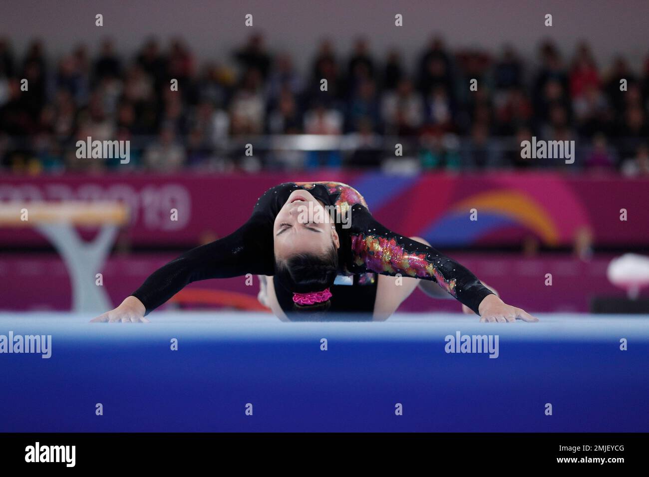 Brooklyn Moors of Canada competes on the floor exercise to win the gold ...